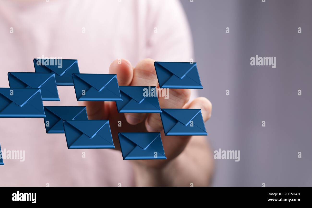 Hands holding rendered mail icons Stock Photo - Alamy