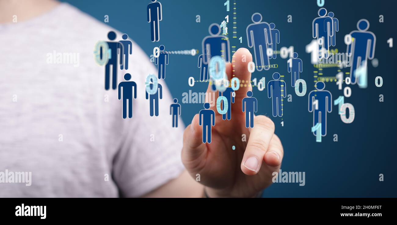 Hand holding 2D people icons Stock Photo - Alamy