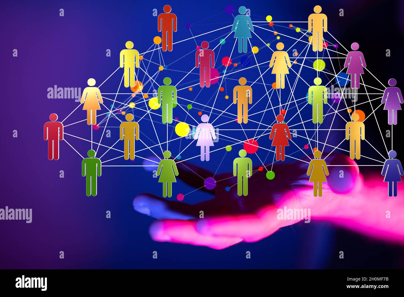 Hand holding 2D people icons Stock Photo - Alamy