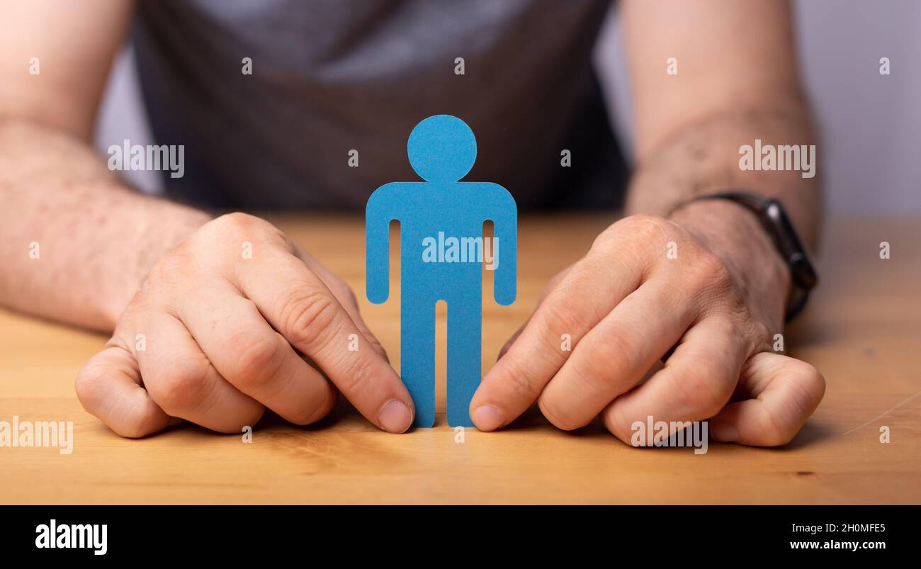 3d of a blue person paper candidate job person symbol held by a male ...