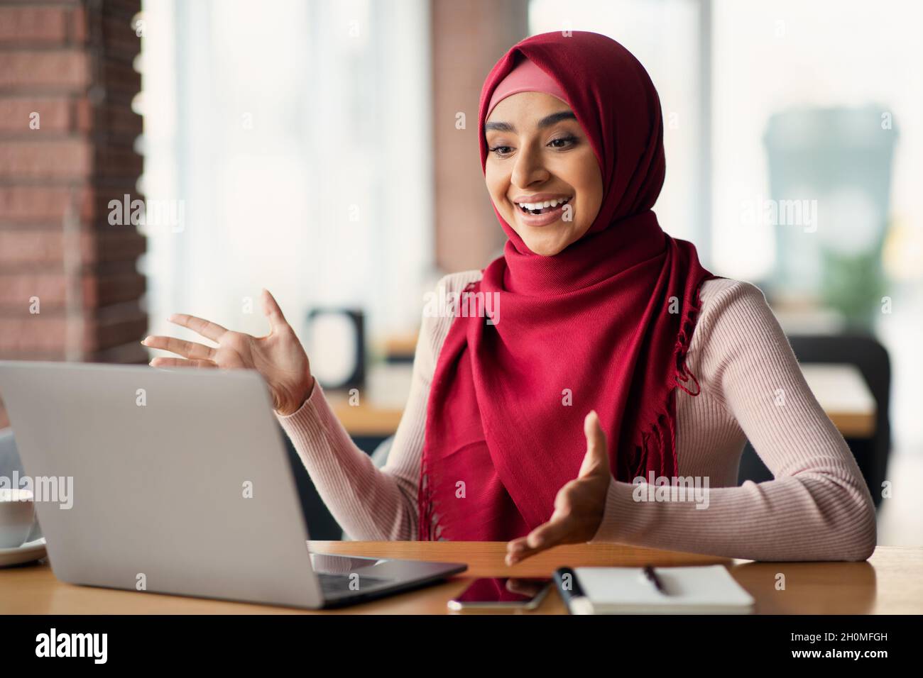Emotional muslim woman having online job interview, using laptop Stock ...