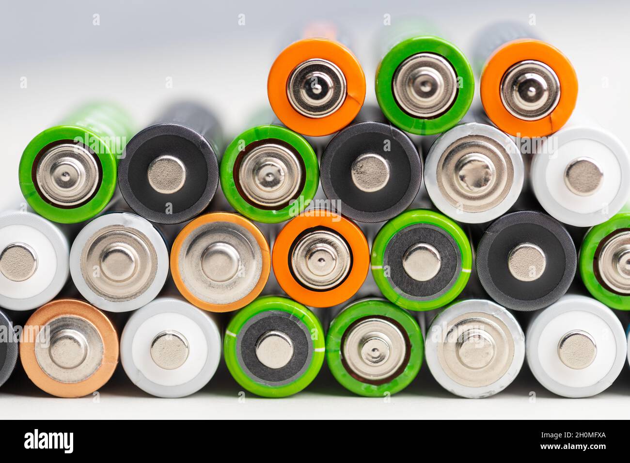 Set of AA batteries on one side Stock Photo - Alamy