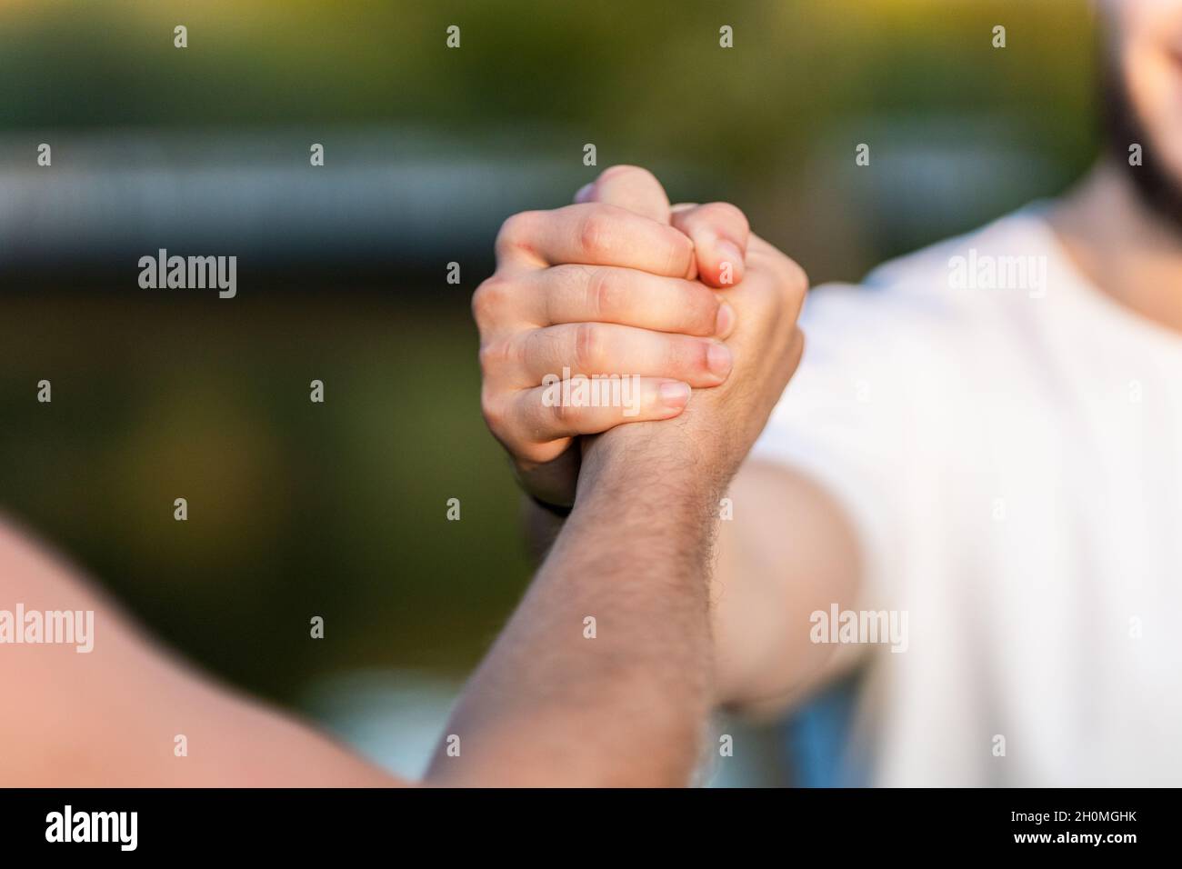 Two men shake hands hi-res stock photography and images - Alamy