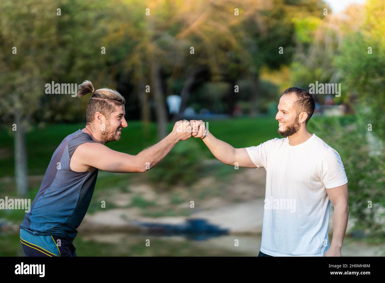 Fist clash greeting hi-res stock photography and images - Alamy