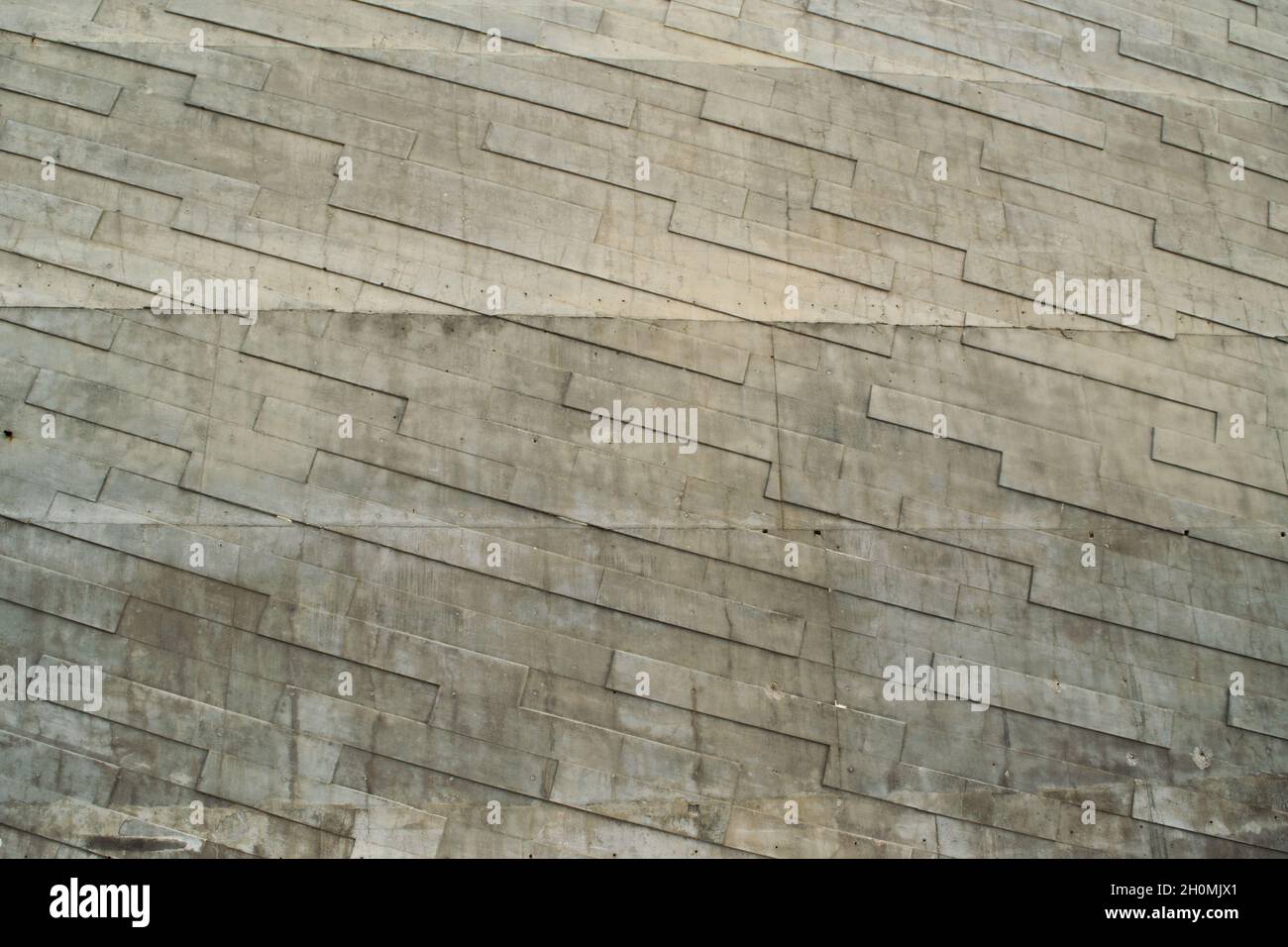 background abstract precast concrete texture formed by inclined ...
