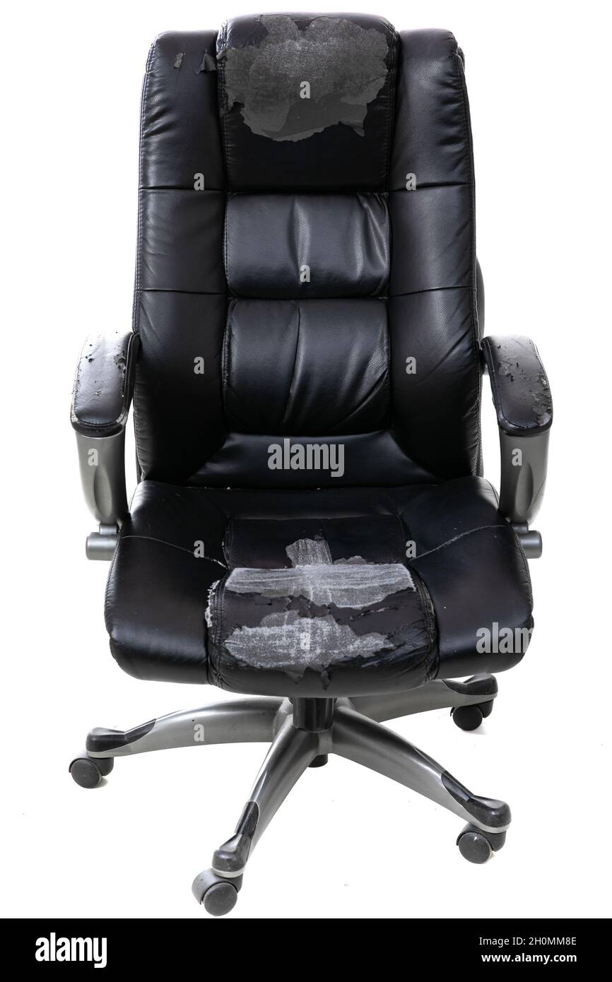 spoiled office leather armchair on white background Stock Photo - Alamy