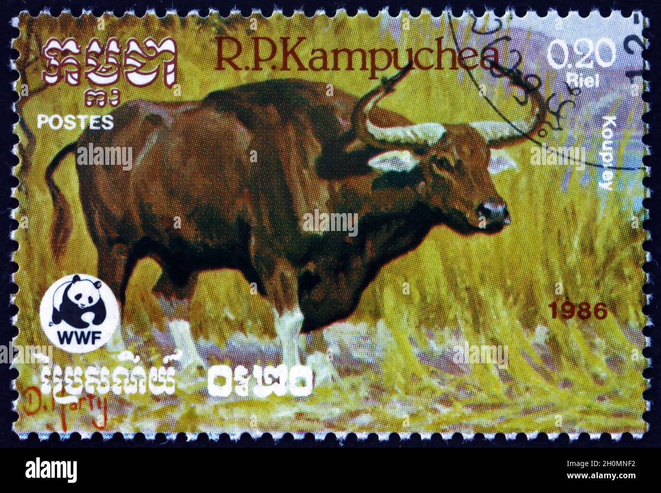 CAMBODIA - CIRCA 1986: a stamp printed in Cambodia shows kouprey, bos ...