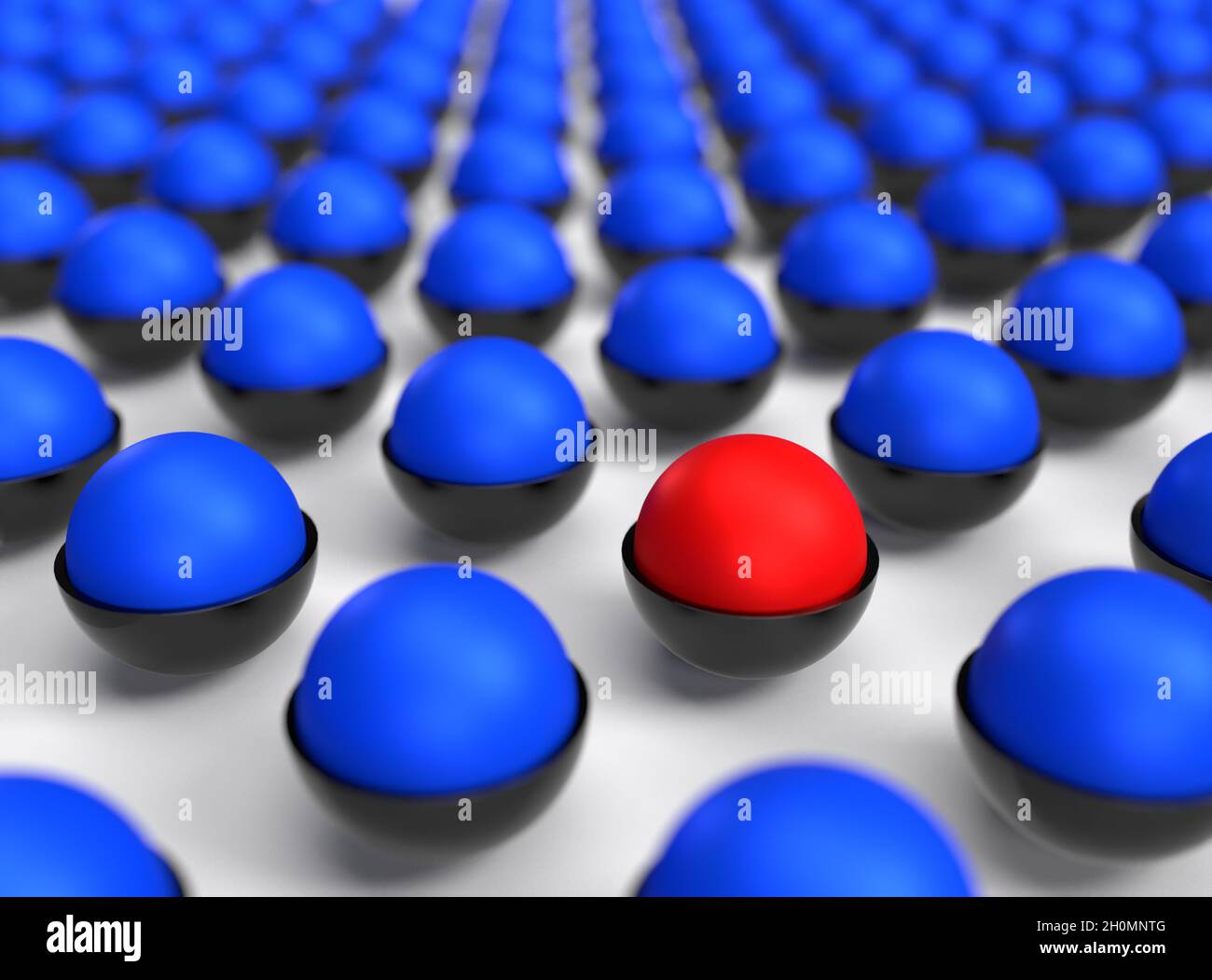 A single red ball in a field of blue balls Stock Photo - Alamy