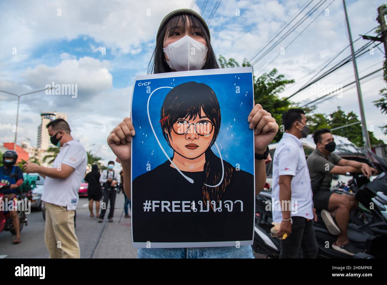 Bangkok, Thailand - 13 Oct 2021, A protester holds a portrait of Benja ...