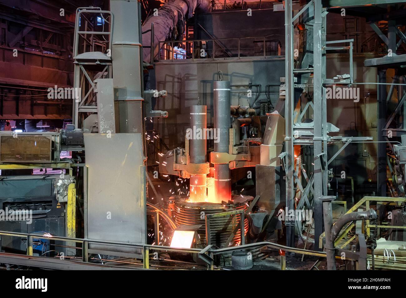 Electric steel furnace, glowing graphite electrodes Stock Photo - Alamy