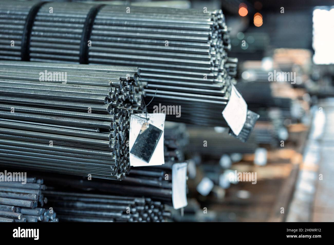 Hot rolled steel, bundle of round metal rods close-up Stock Photo - Alamy