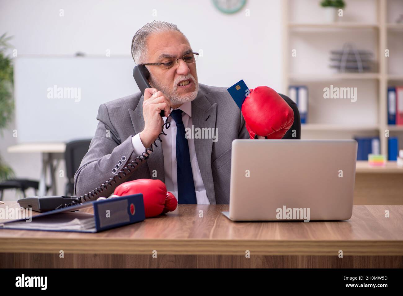 Stressed paying by credit card phone hi-res stock photography and ...