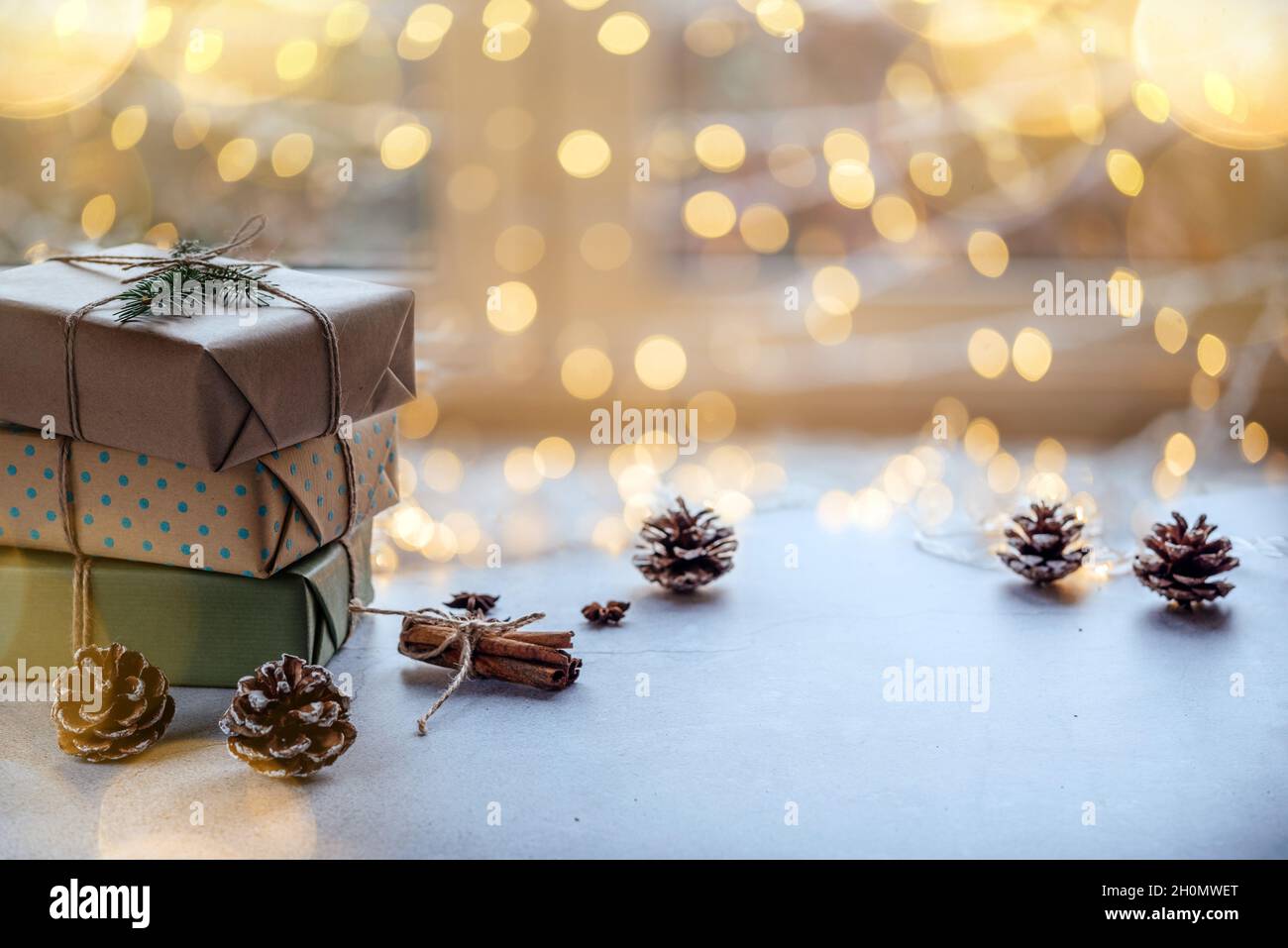 Christmas zero waste packaging gift boxes wrapped in kraft paper with ...