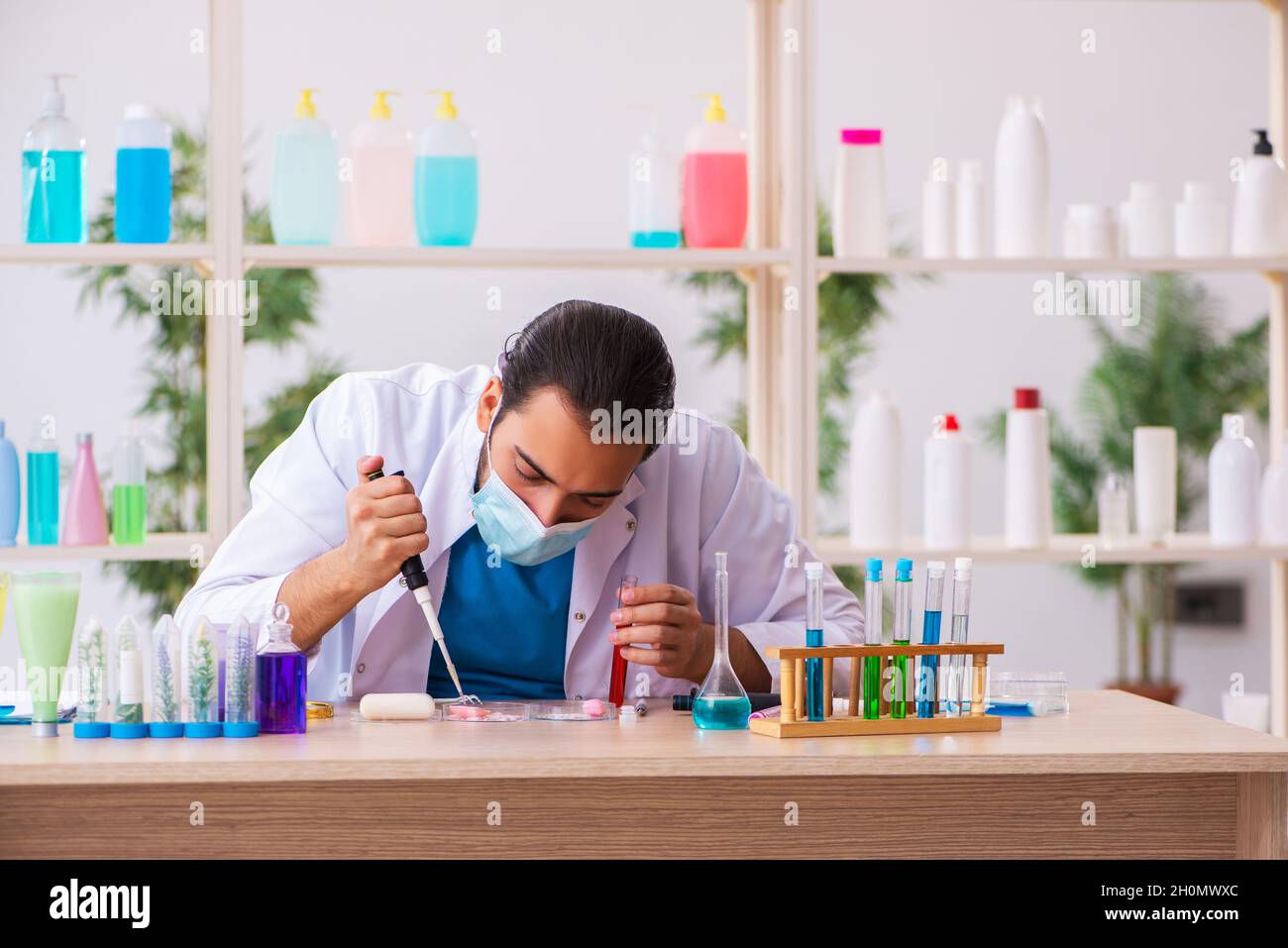 Young chemist testing soap in the lab Stock Photo - Alamy