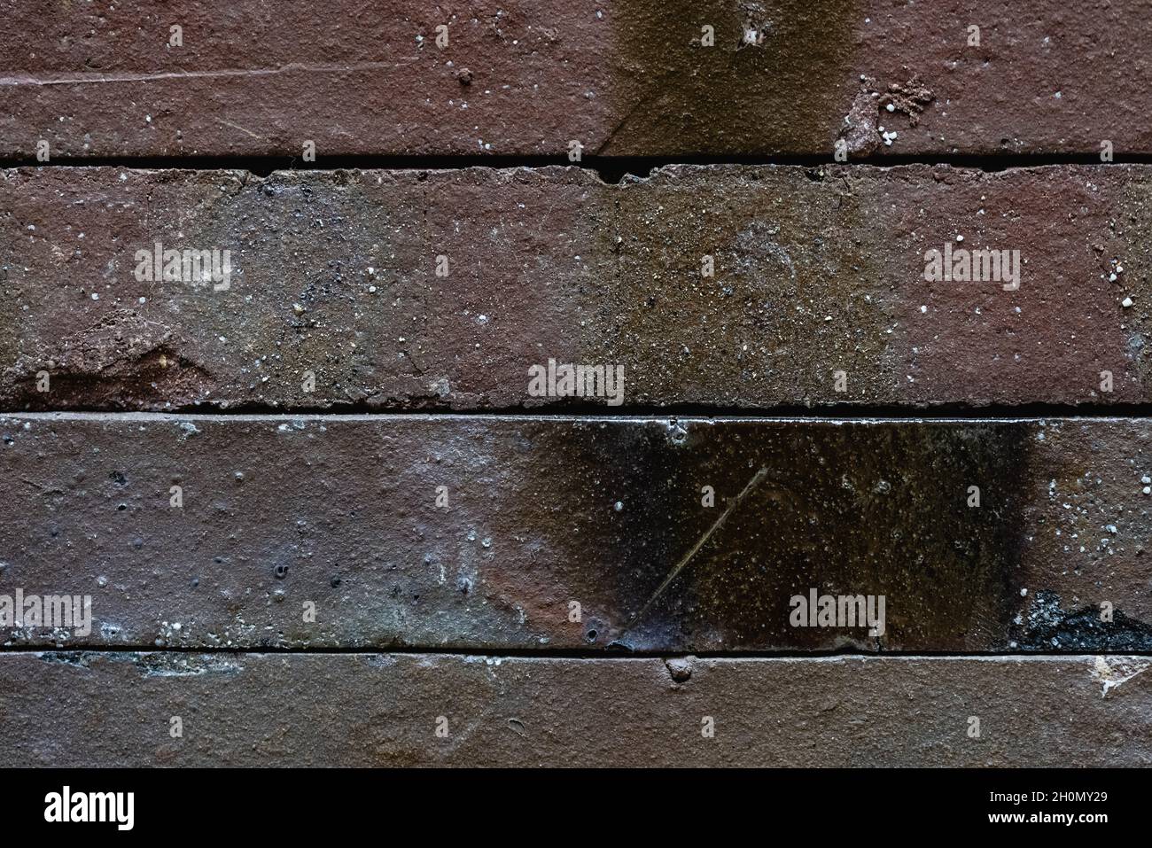 Close-up texture of a brown decorative scratched brick with a gap Stock ...