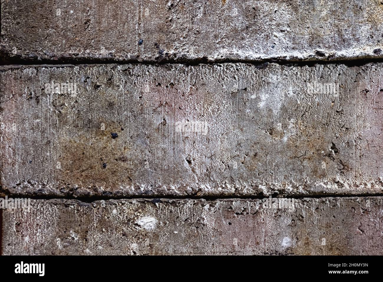 Close-up texture of a brown decorative scratched brick with a gap Stock ...