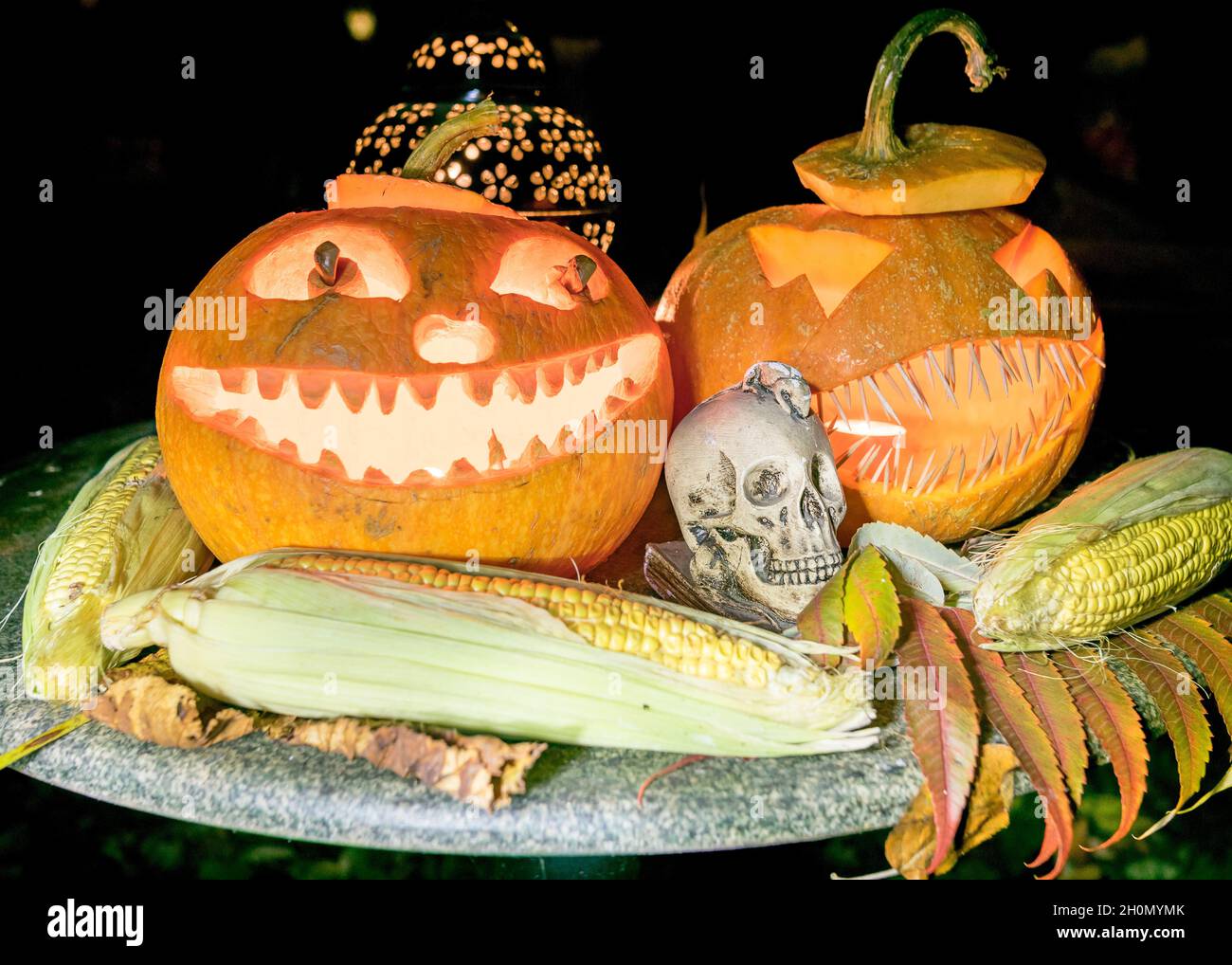 halloween composition with smiling pumpkins and halloween accessories ...