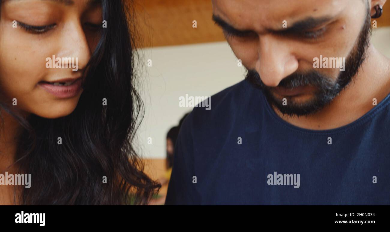 South Asian young people from India indoors Stock Photo - Alamy