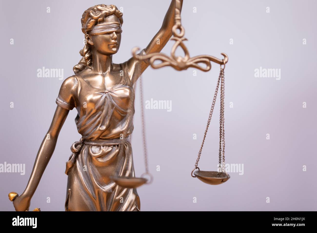 Face of lady justice or Iustitia - The Statue of Justice on a gray ...