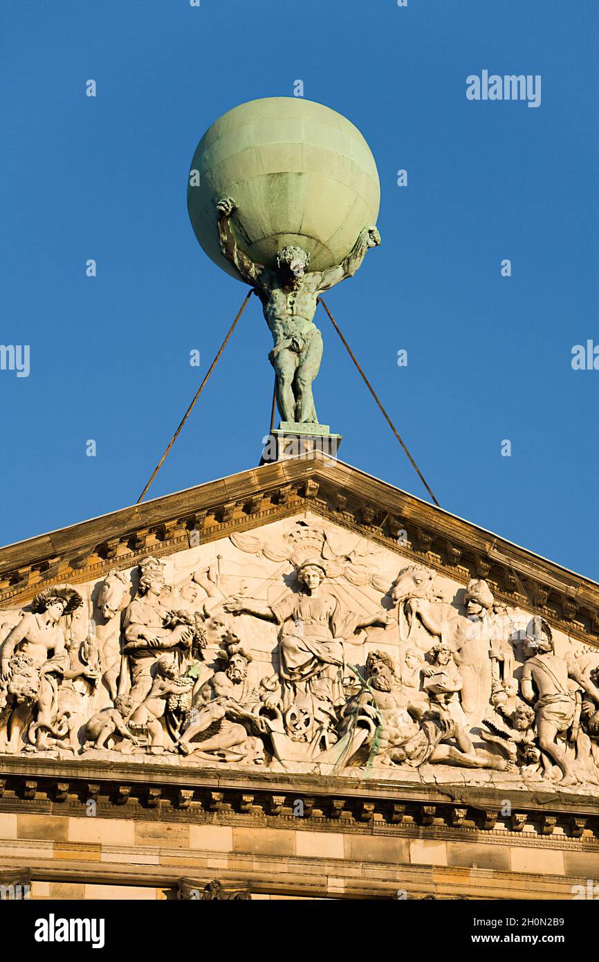 NETHERLANDS, NORTH HOLLAND, AMSTERDAM. STATUE OF ATLAS GIANT ON DAM ...