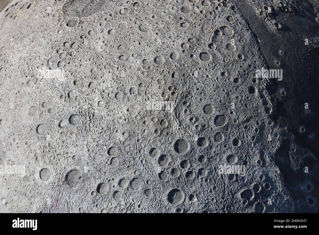 A picture of craters on the surface of the moon Stock Photo - Alamy