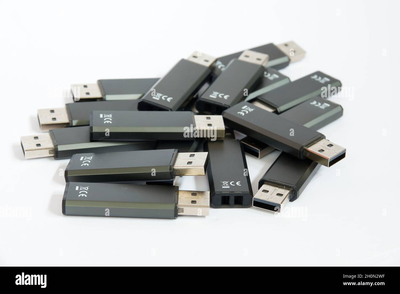 Close up of many black USB sticks with white background Stock Photo - Alamy