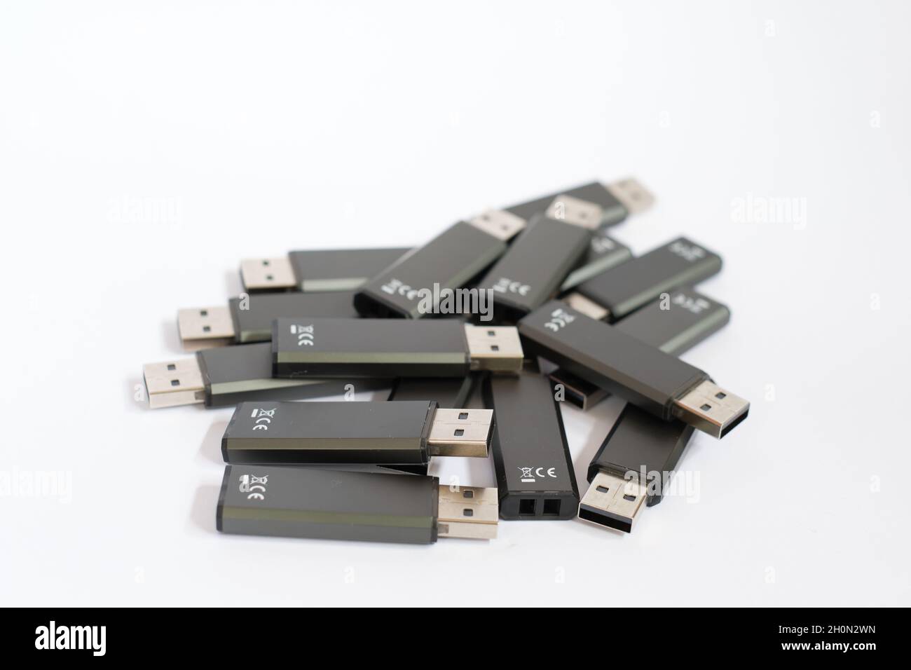 Many black USB sticks with white background Stock Photo - Alamy