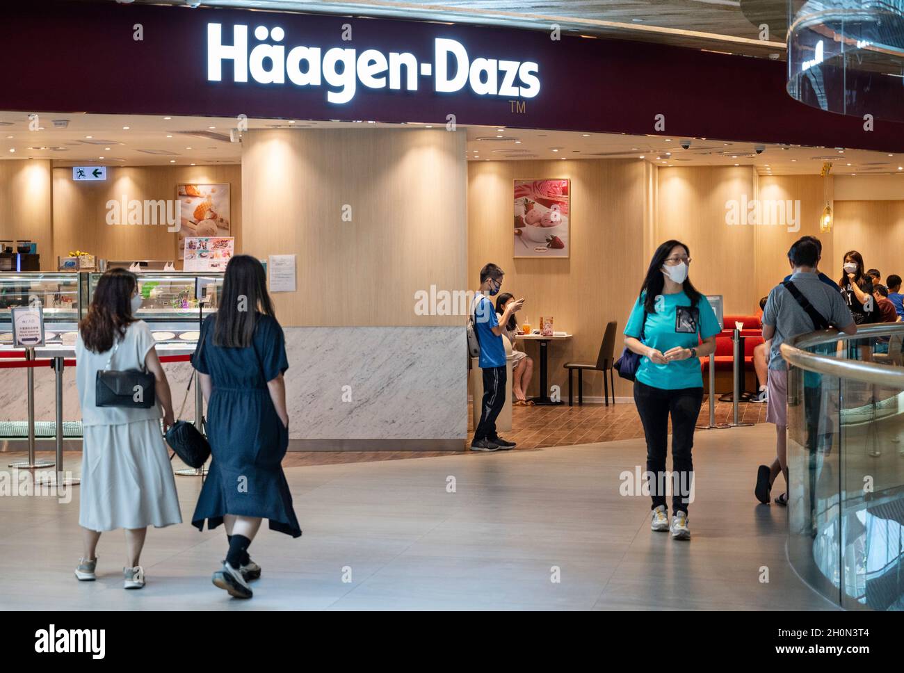 Customers are seen at the American ice cream brand Häagen-Dazs store in ...