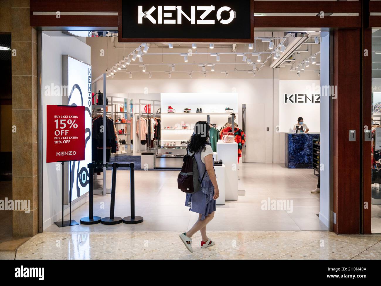 A shopper is seen at the French luxury fashion house owned by LVMH and ...