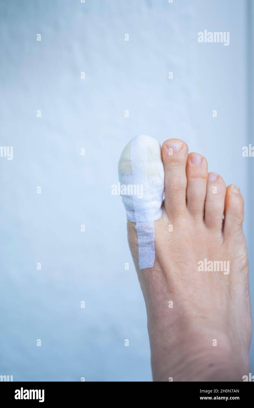 Foot big toe bandage injured feet in medical clinic hospital center ...