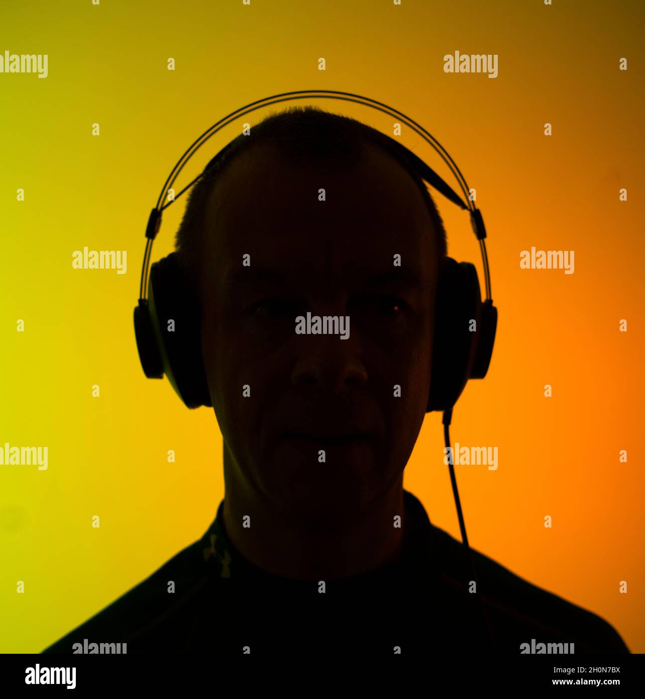Dj deejay electronic wearing music headphones with coloured lights ...