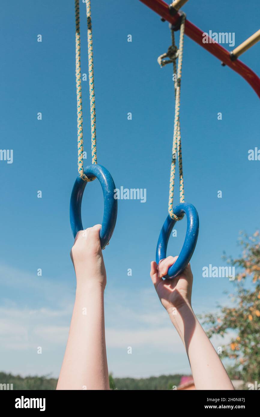 Gymnast performing rings hi-res stock photography and images - Alamy
