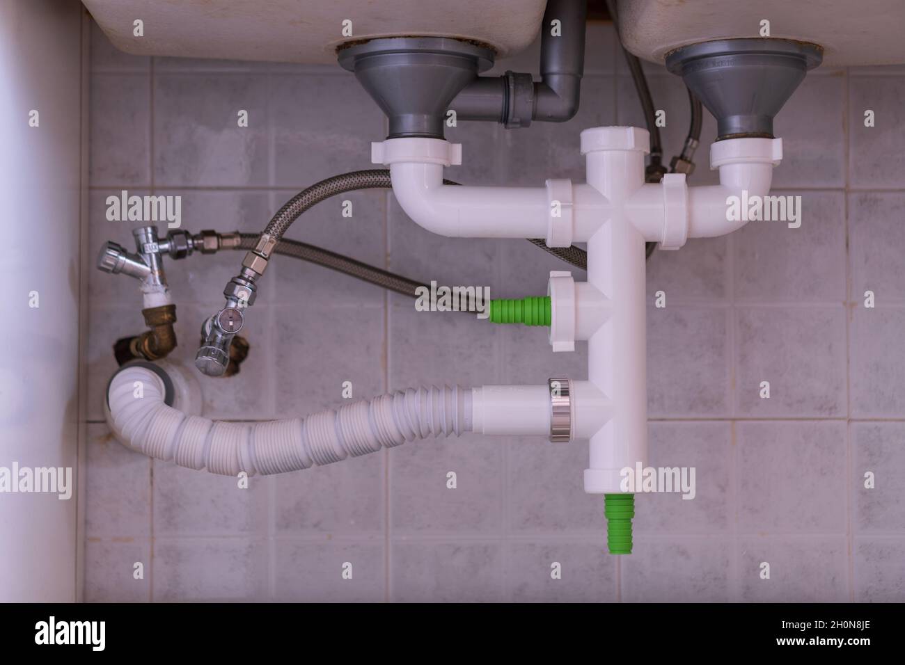 Kitchen pipes of pvc Stock Photo - Alamy