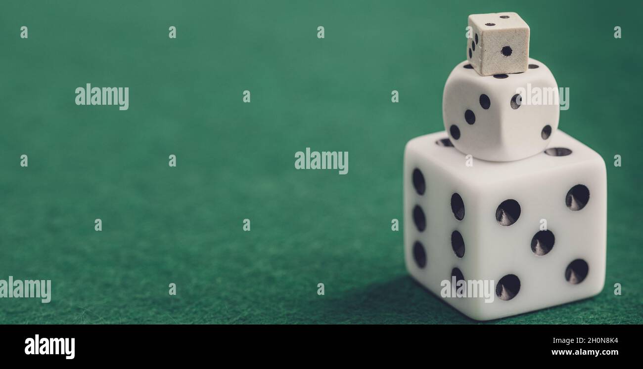 Colored board game figures with dice. Board games concept Stock Photo ...