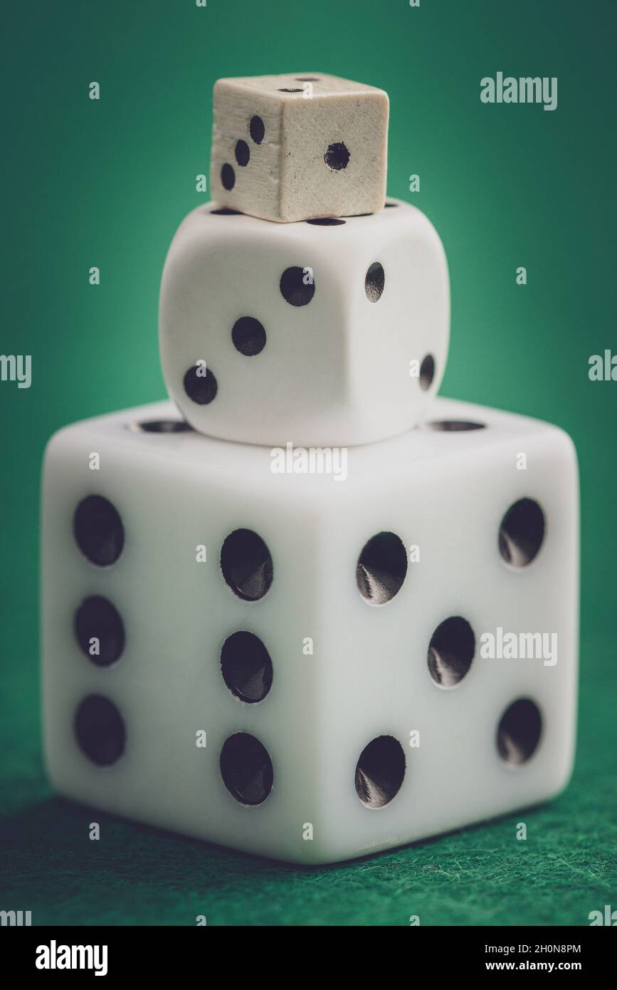 Colored board game figures with dice. Board games concept Stock Photo ...