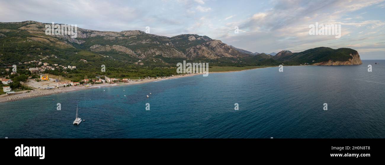 Aerial view of Jaz Beach promontory in the background. Budva ...
