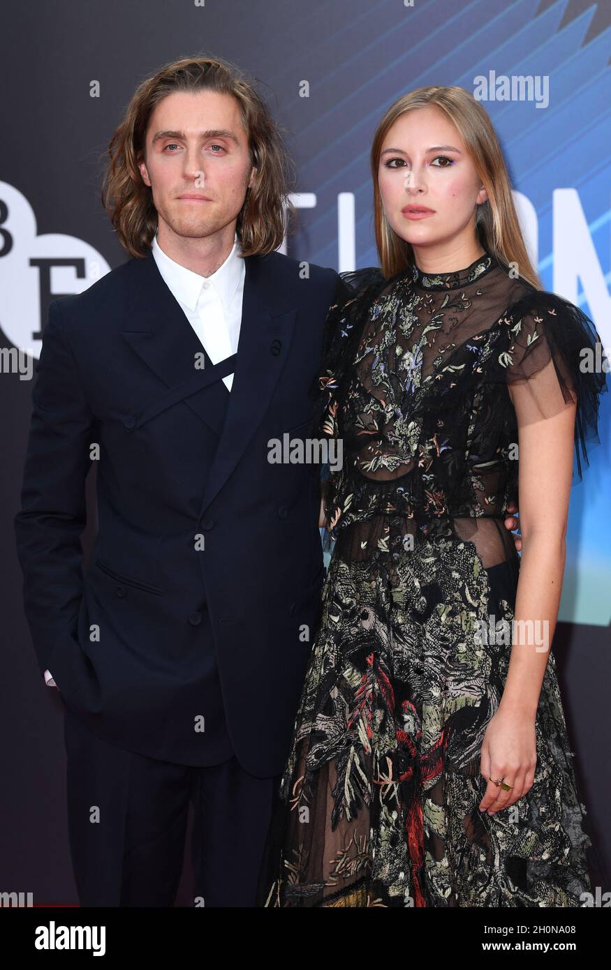 October 13th, 2021, London, UK. Jack Farthing, Hanako Footman arriving ...