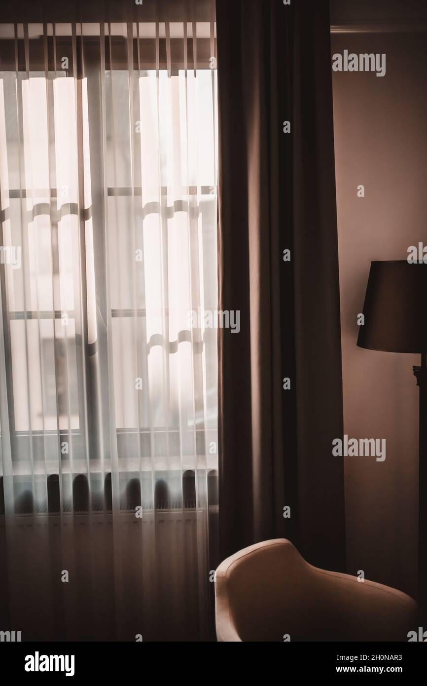 Cozy interior in warm colors in the dim light from the window Stock ...