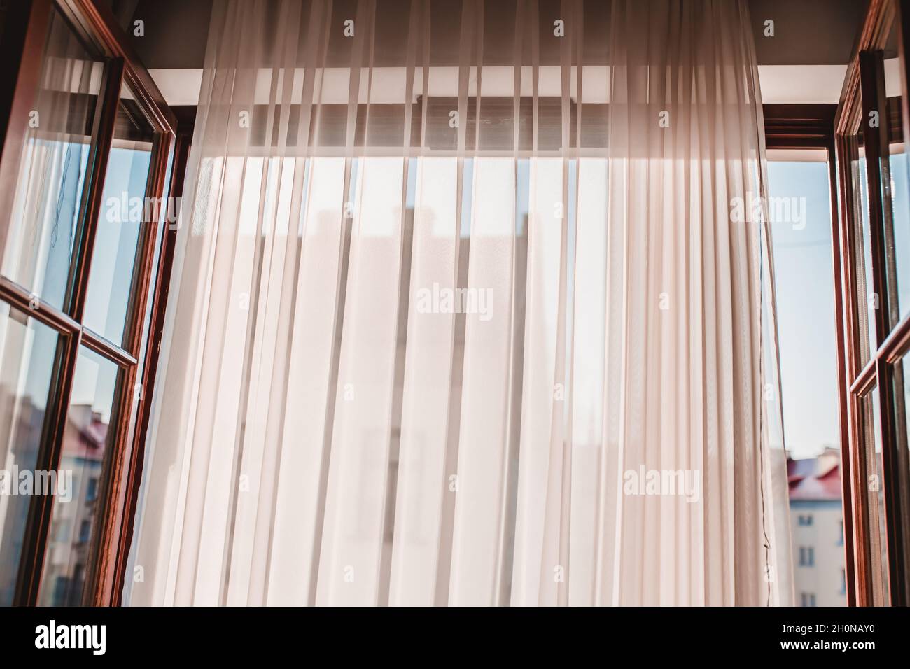 Light through window curtains hi-res stock photography and images - Alamy