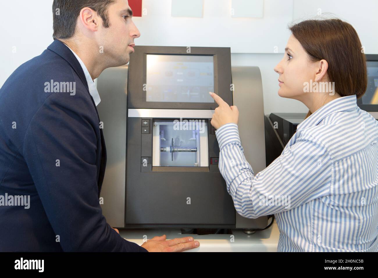 Attractive cash point machine hi-res stock photography and images - Alamy