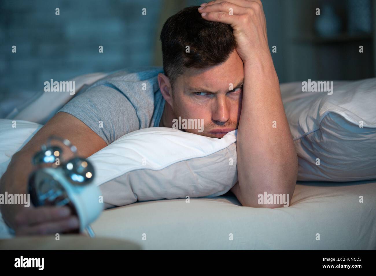 tired man does not want to wake up Stock Photo - Alamy