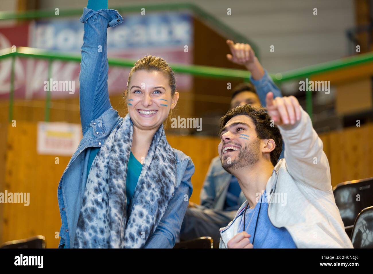portrait of young fans celebrating Stock Photo - Alamy