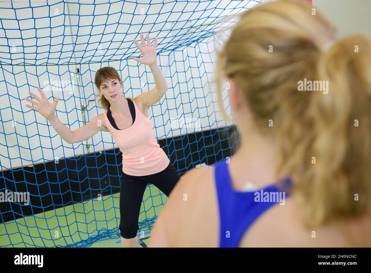 portrait of girls playing handball Stock Photo - Alamy