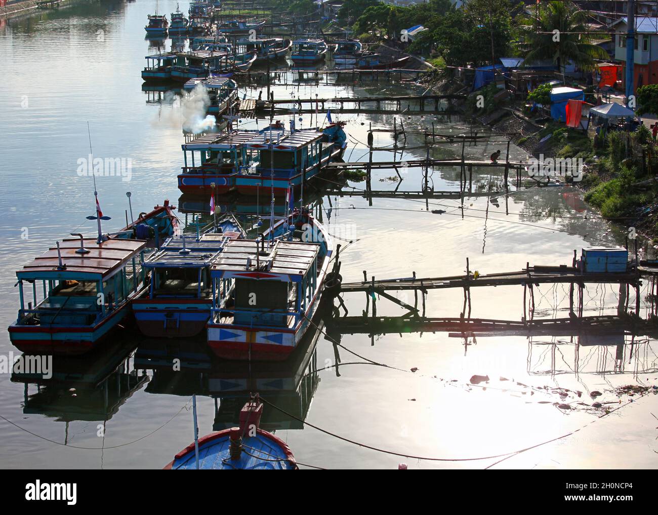 Muaro is a small old port on the Batang Arau river used by many small ...