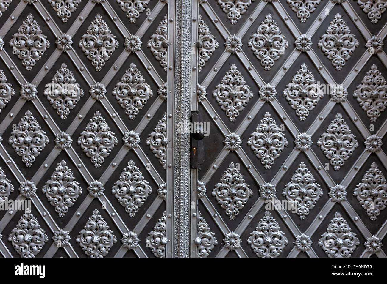 Decorative metal door ornament. Antique iron door with classic ...