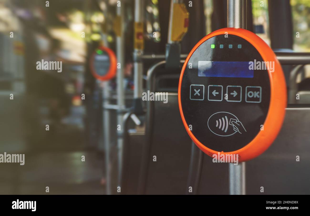 Ticket validation system on modern public transport Stock Photo - Alamy