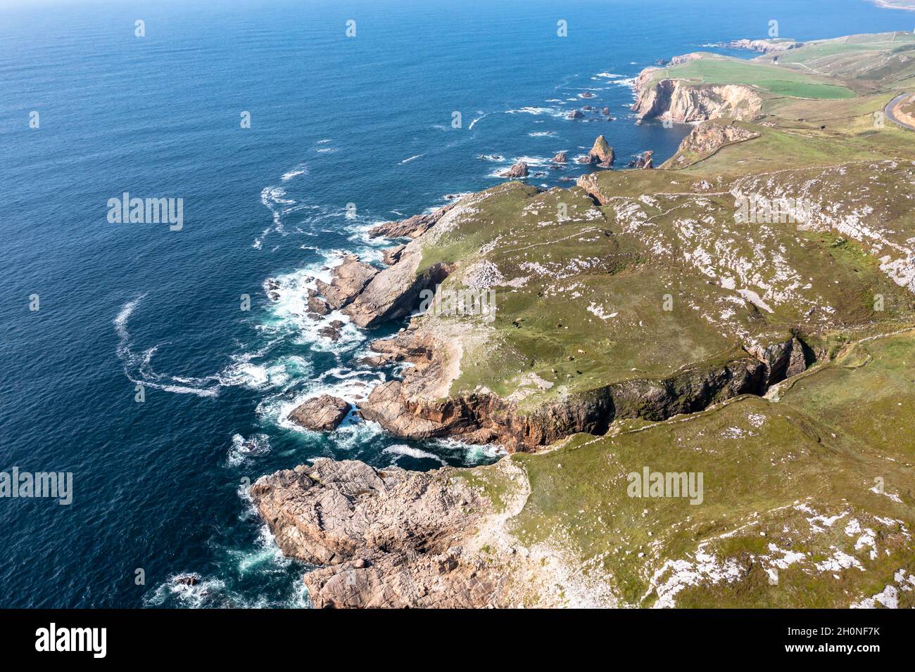 Aerial view of the rocks in the sea at Crohy Head Sea Arch, County ...