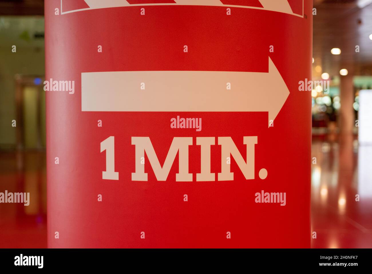 White arrow on red background hi-res stock photography and images - Alamy