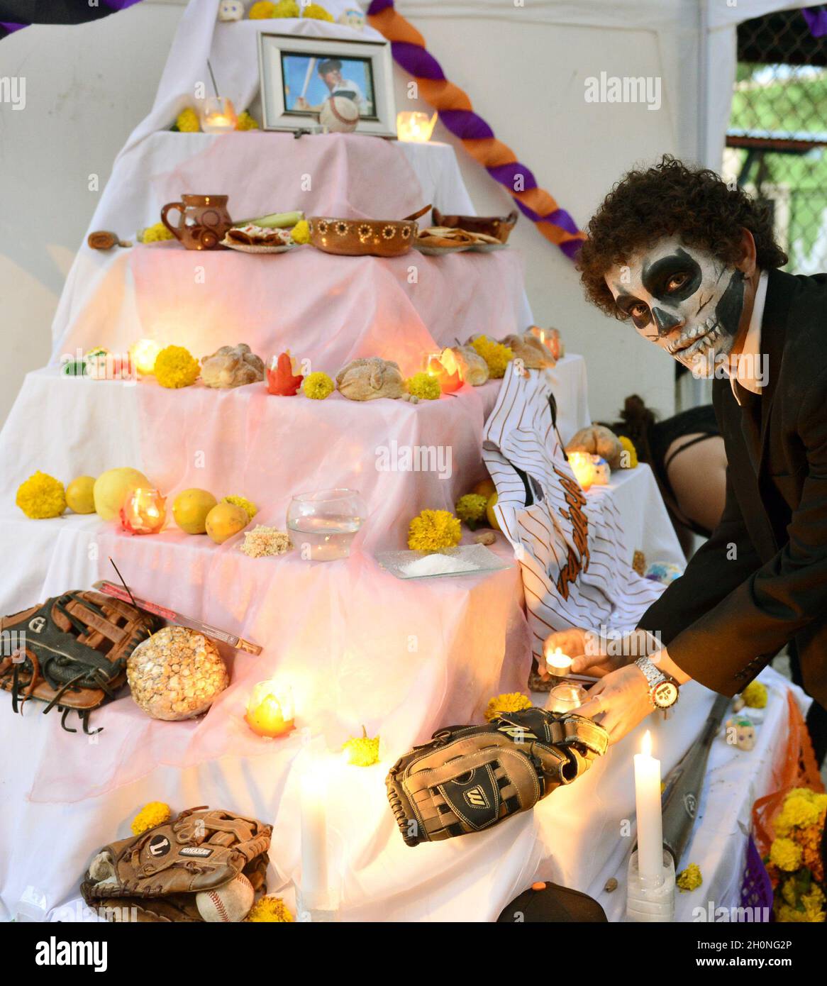 Altar with baseball gloves. La Catrina, altar on Day of the Dead 2015 ...
