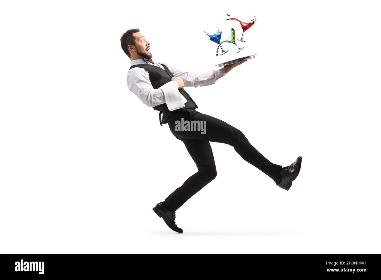 Full length profile shot of a waiter falling with a tray of cocktails ...